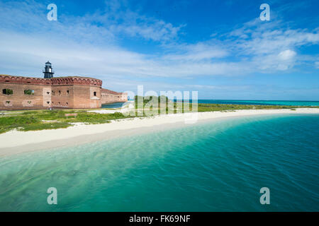 White sand beach with Fort Jefferson in the background, Dry Tortugas ...