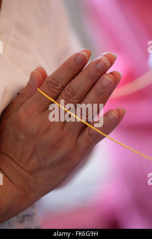 Sai-Sin (sacred thread) in use at a temple ceremony, International ...