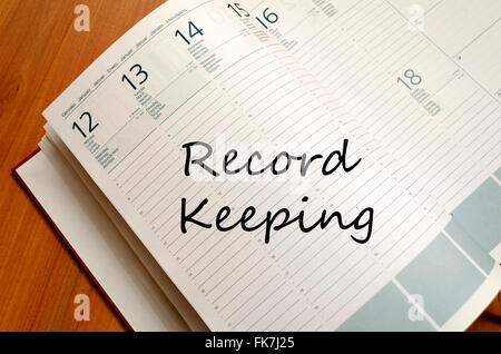 Record keeping text concept write on notebook with pen Stock Photo - Alamy