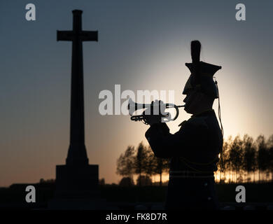Silhouette of a man playing a bugle Stock Photo - Alamy