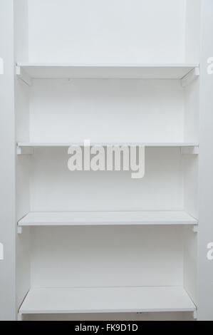 Empty white shelves ideal for placing an object Stock Photo - Alamy