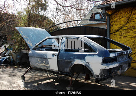 Old car chassis in preparation for painting Stock Photo - Alamy