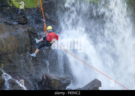 Waterfall rappelling practice in Sao Sebastiao Stock Photo - Alamy