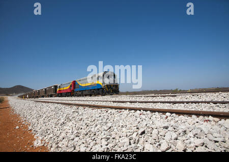 Train carrying gravel unloading work in the line of Railroad ...