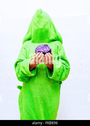 Person holds food wrapped in flatbread Stock Photo - Alamy
