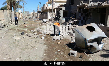 Fallujah, Iraq. 8th Mar, 2016. Debris of a destroyed building is seen ...