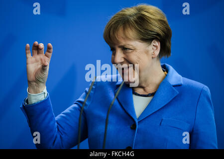 German Chancellor, Angela Merkel, gestures as she speaks during the ...