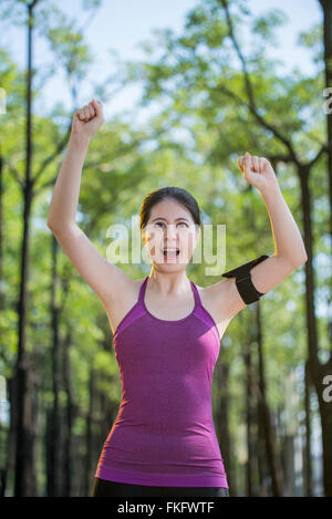 Happy young woman celebrating Chinese New Year Stock Photo - Alamy