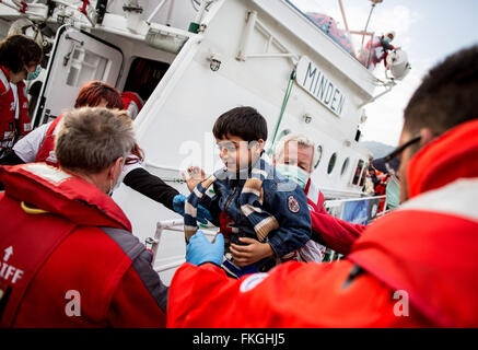 Rescuers use rubber boat during the search for missing people at ...