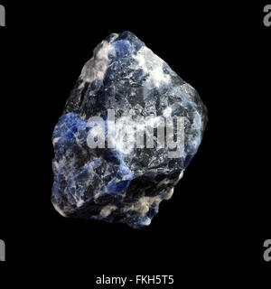 Raw sodalite stone isolated on white background Stock Photo - Alamy