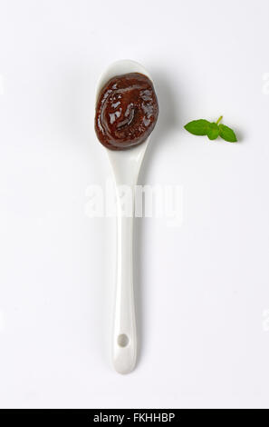 spoon of plum jam Stock Photo - Alamy