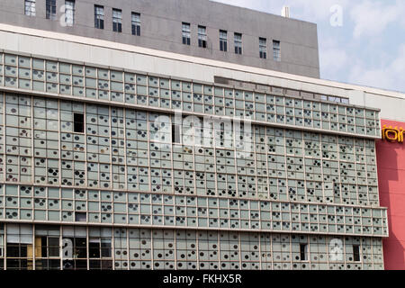Shanghai, Shanghai, CHN. 7th Mar, 2016. A building covered with bullet ...