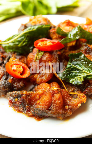 phad phed pla duk thod krob (stir fried deep fried catfish with curry ...