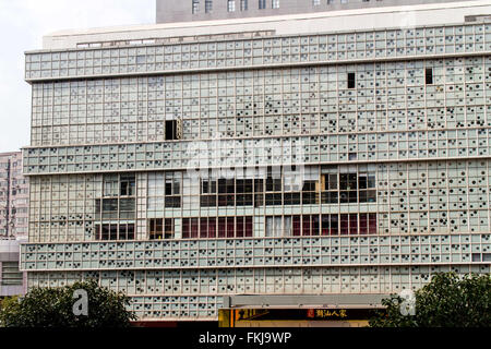 Shanghai, Shanghai, CHN. 7th Mar, 2016. A building covered with bullet ...