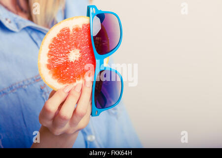 Summer girl holding grapefruit. Happy tourist enjoyed vacation Stock ...