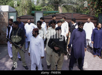 Lahore, Pakistan. 9th March, 2016. Pakistani police guard stand Stock ...