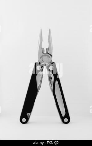 Swiss army knife in front of white background Stock Photo - Alamy