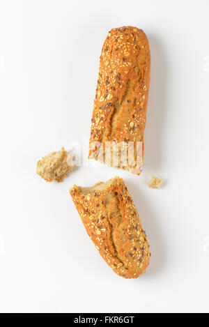 halved bread roll with seeds on white background Stock Photo - Alamy