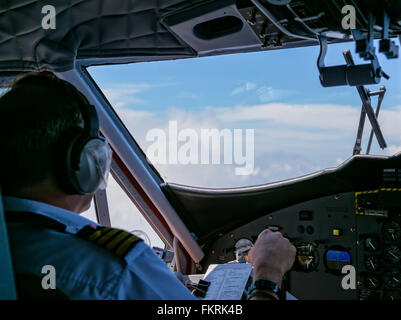 Small airplane cockpit with rear-view mirror Stock Photo - Alamy