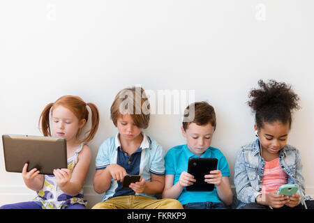 Children using technology Stock Photo - Alamy
