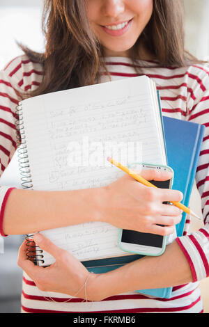 Young Japanese woman holding a mobile phone Stock Photo - Alamy