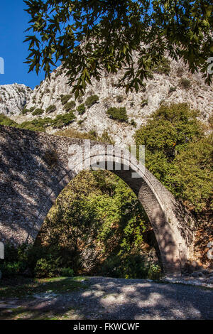 The old stone bridge of Pyli village in Thessaly, Greece Stock Photo ...