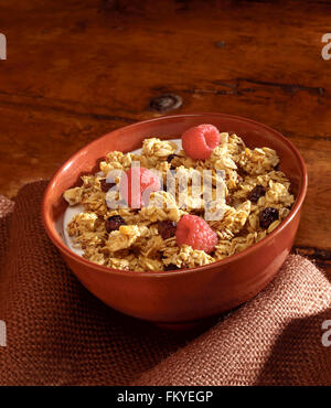 Breakfast, a cup of oatmeal with nuts and raisins, a cup of hot black ...