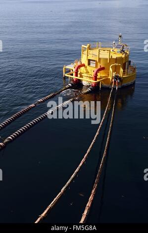 floating oil supply system in the sea Stock Photo - Alamy