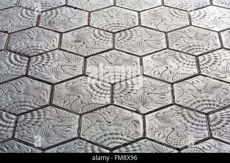 Hexagonal tiles designed by Antoni Gaudi decorated with sea elements ...