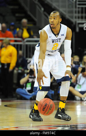 West Virginia guard Jevon Carter (2) drives up court as Coppin State ...