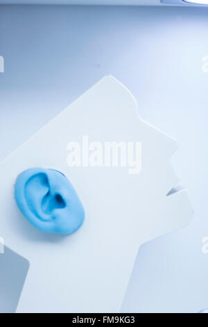 Hearing aid on prosthetic ear in store shop window display Stock Photo ...