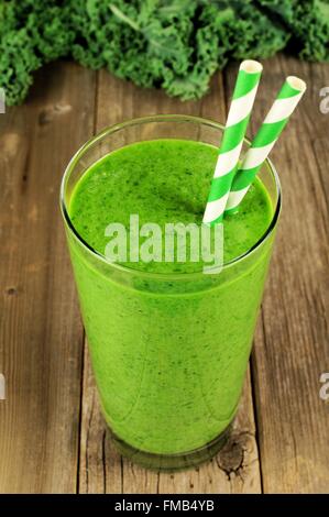 Close-up of aged vertical wood planks with exposed grain, wear marks ...