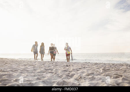 Happy friends bringing their stuff Stock Photo - Alamy