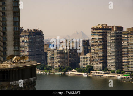 Cairo panorama skyline showing the Giza Pyramids in the distance with ...