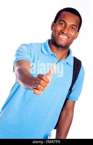 Smiling student with thumbs up Stock Photo - Alamy