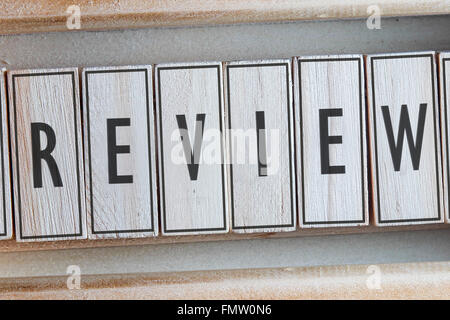 Review word written with a typewriter Stock Photo - Alamy