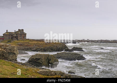 Trearddur Bay, Anglesey, North Wales, UK. View across rough stormy sea ...