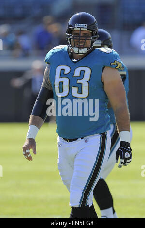 Jacksonville Jaguars center Brad Meester (63), center, leads his team ...