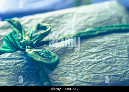 blue gift packing tied by ribbon, isolated on white with path Stock ...