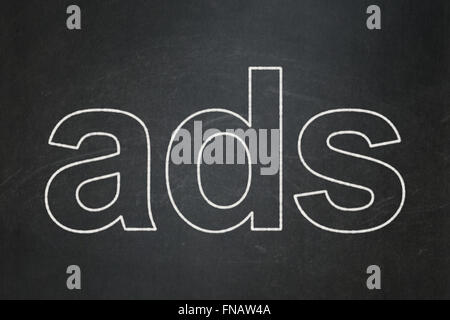 Advertising concept: Ads on chalkboard background Stock Photo - Alamy
