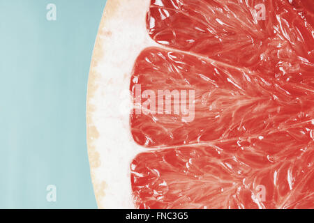 Retro Effect Of Fresh Red Grapefruit Slice Stock Photo - Alamy