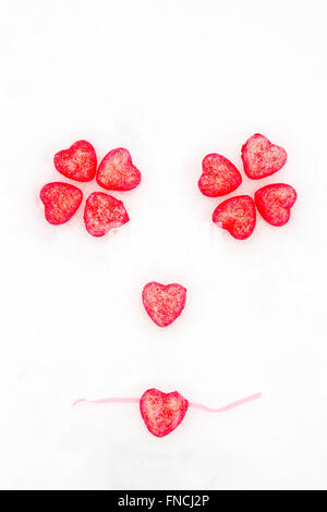 Pink hearts in the snow Stock Photo - Alamy