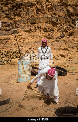 Preparing Zarb, a Bedouin meal in the Wadi Rum desert, Hashemite ...