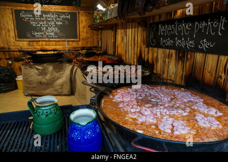 Budapest, Hungary Rooster testicles stew cooking at a food stall in the ...