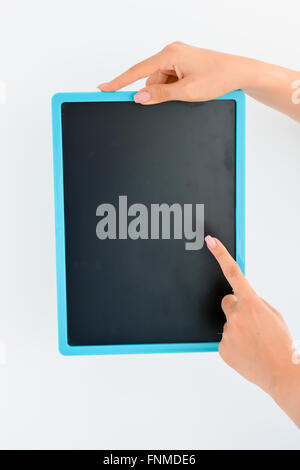 Hand of a teacher pointing to a blank blackboard in the school Stock ...