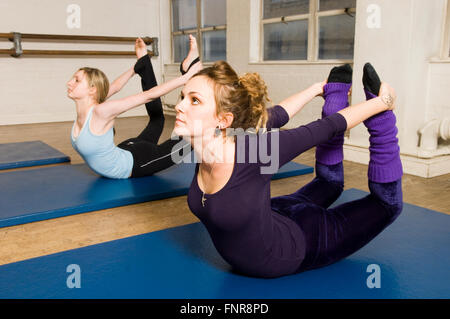 Pilate's Rocker routine being practiced in fitness lesson Stock Photo ...