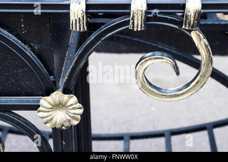 Black metal grill with gilt paint Stock Photo - Alamy