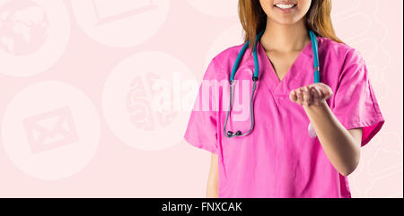 Composite image of asian nurse stretching out hand Stock Photo - Alamy
