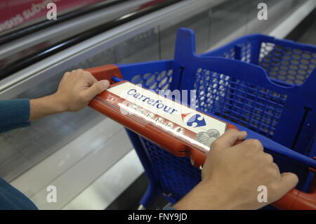 Carrefour Shopping Trolley on an escalator within the supermarket in ...