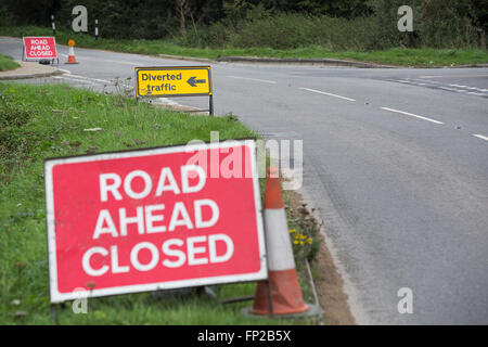 Diverted traffic sign. Road sign showing a diversion all the way around ...
